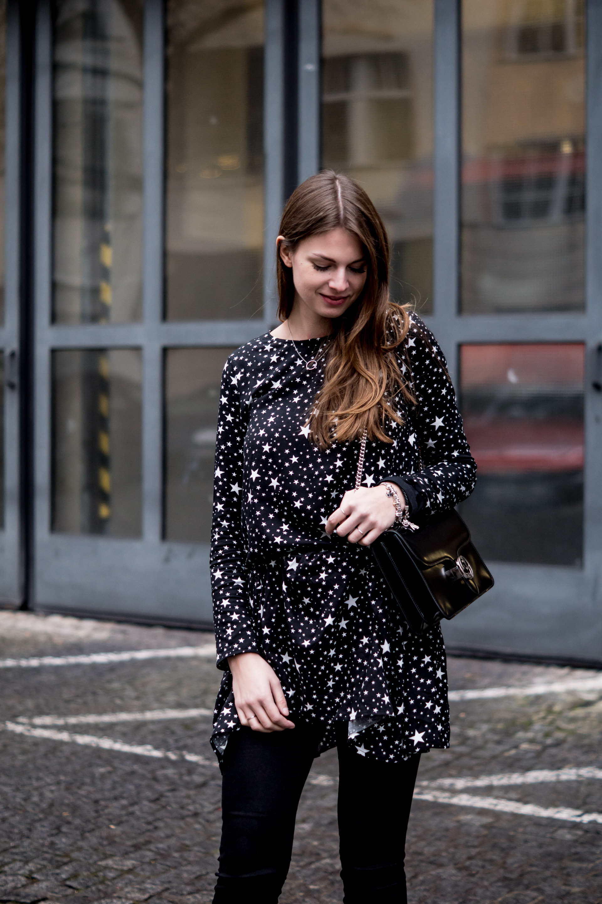 Dress in Star Print over black jeans || Layering in winter