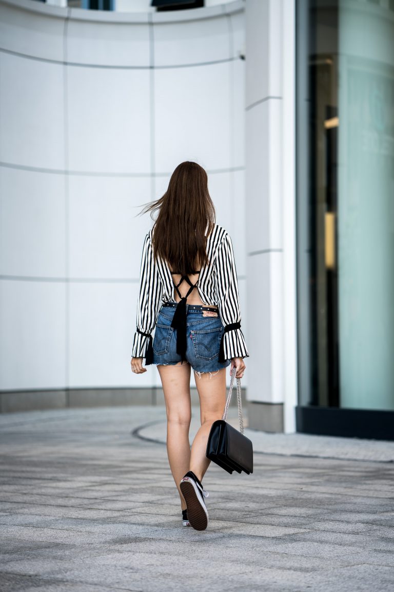 A striped shirt with that certain something || open back shirt